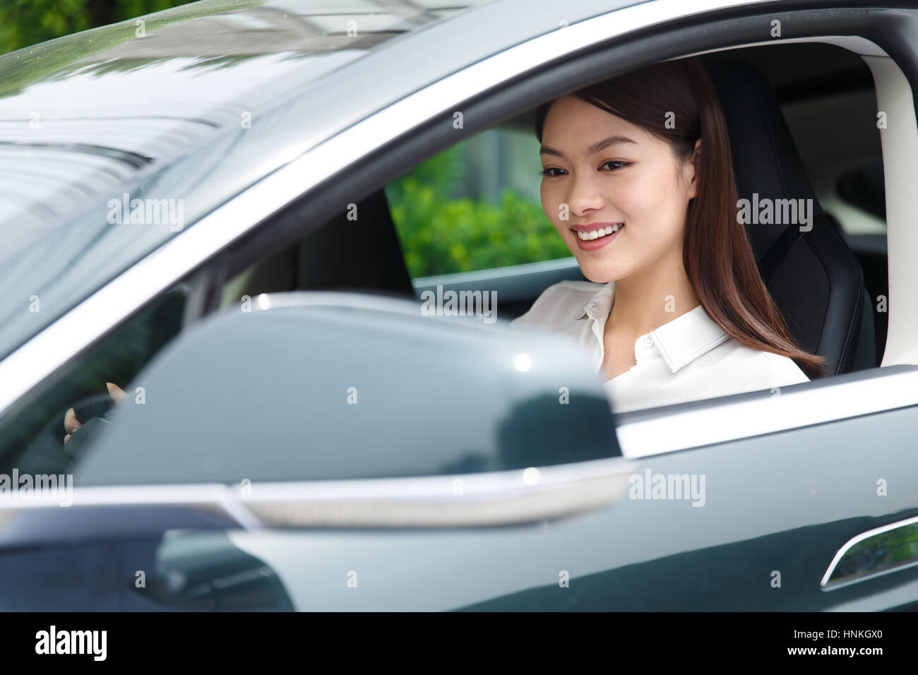 Young women drive Stock Photo - Alamy