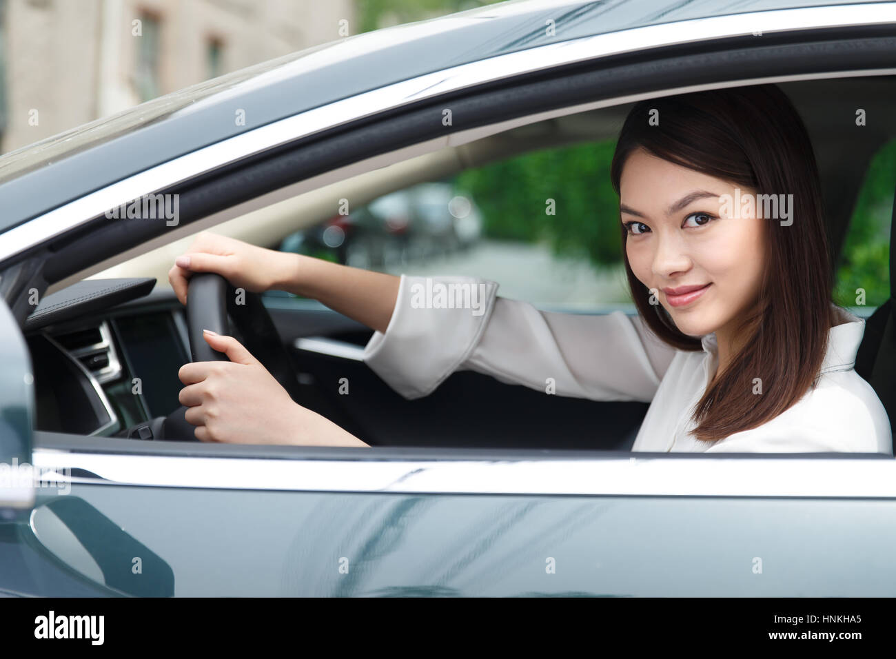 Young women drive Stock Photo - Alamy
