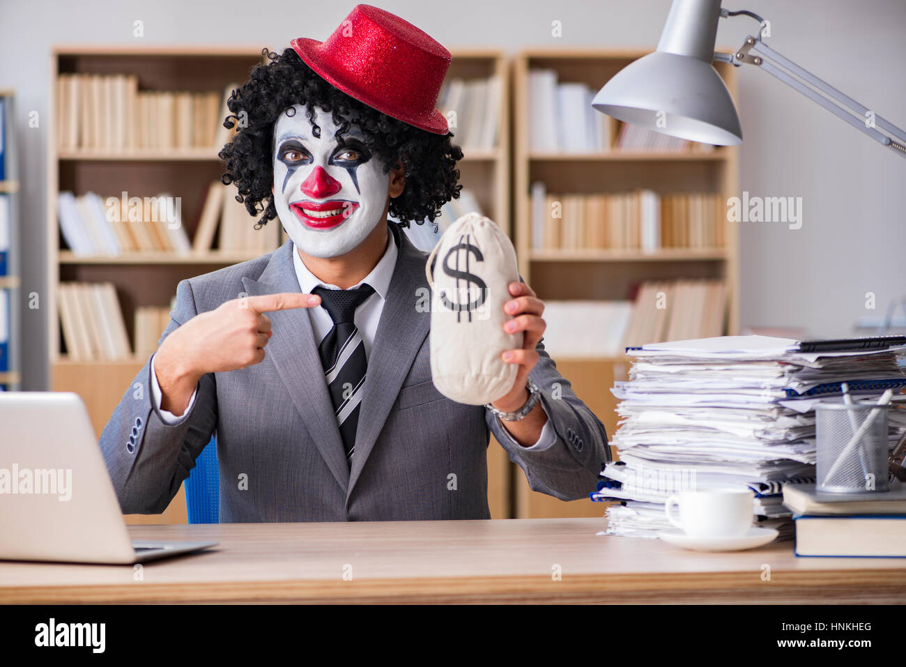 Clown businessman working in the office Stock Photo - Alamy