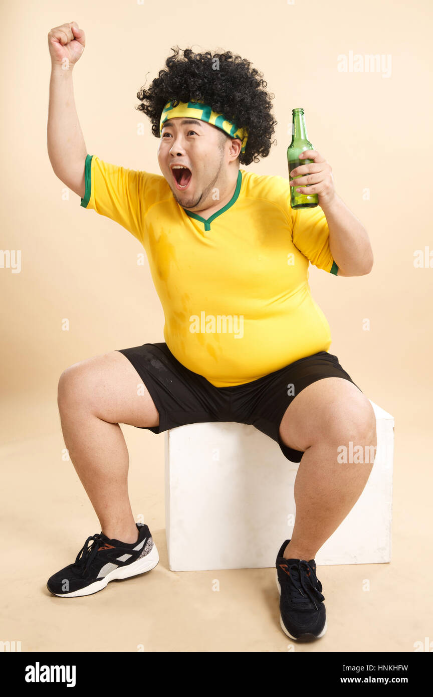 Young male fans Stock Photo - Alamy