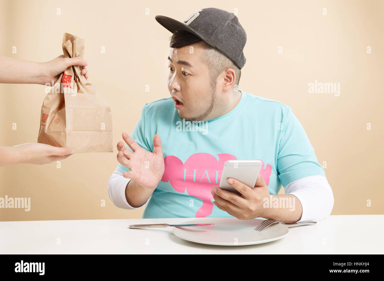 Fat men eating fast food hi-res stock photography and images - Alamy