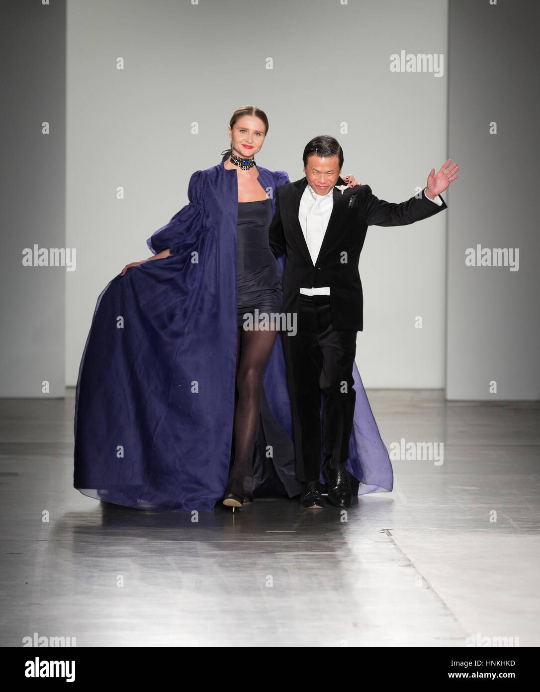 New York, United States. 13th Feb, 2017. Designer Zang Toi & model walk ...