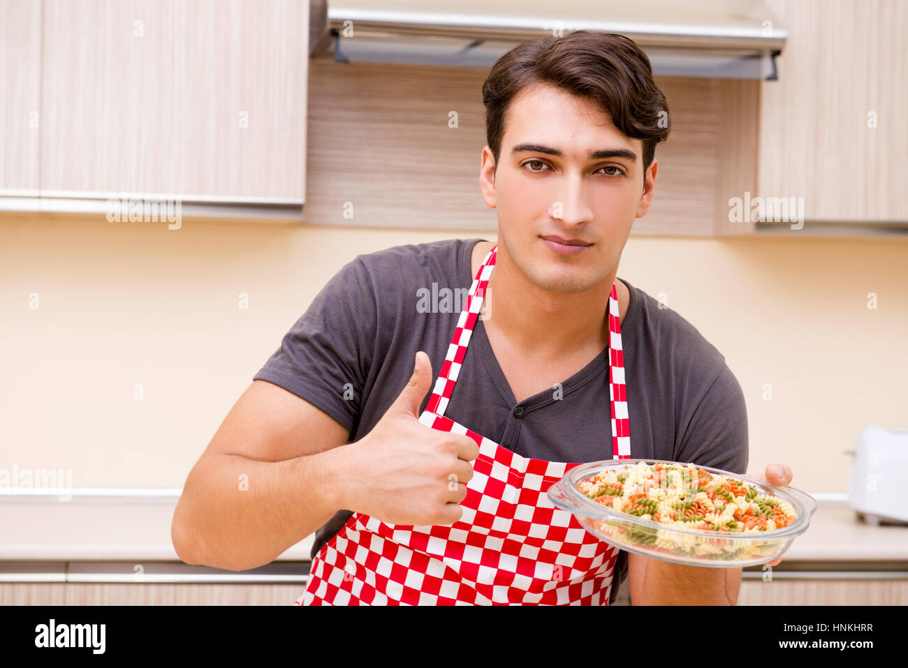 Man male cook preparing food in kitchen Stock Photo - Alamy