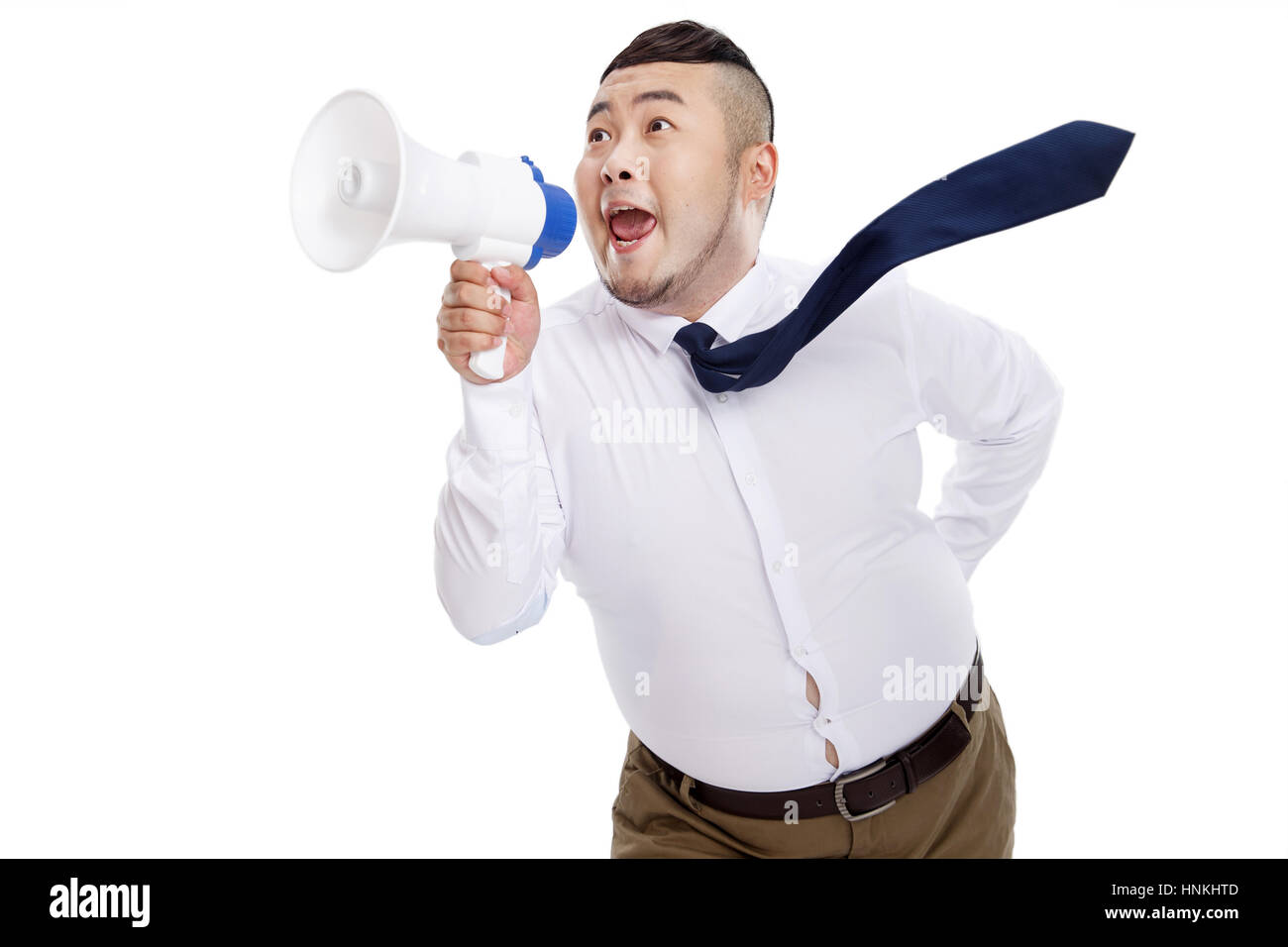 The fat man with a megaphone shouting business Stock Photo - Alamy