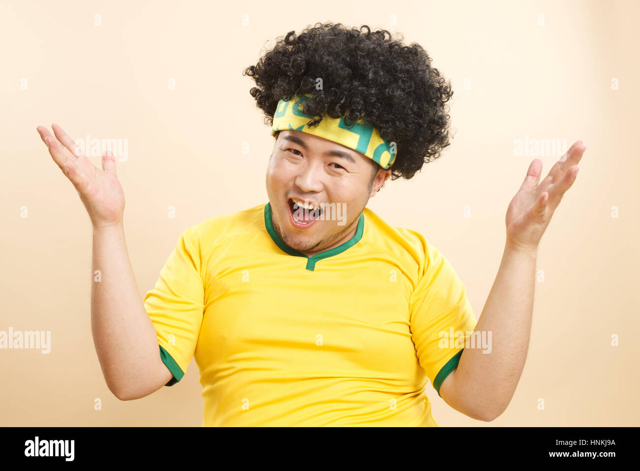 Excited young male fans Stock Photo - Alamy