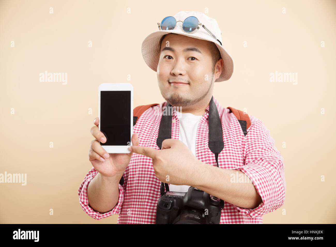 Fat man holding a cell phone Stock Photo - Alamy