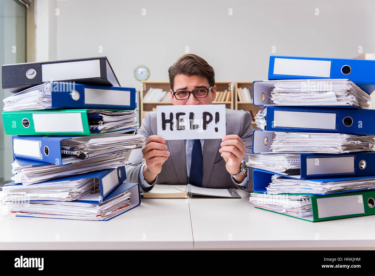 Busy businessman asking for help with work Stock Photo - Alamy
