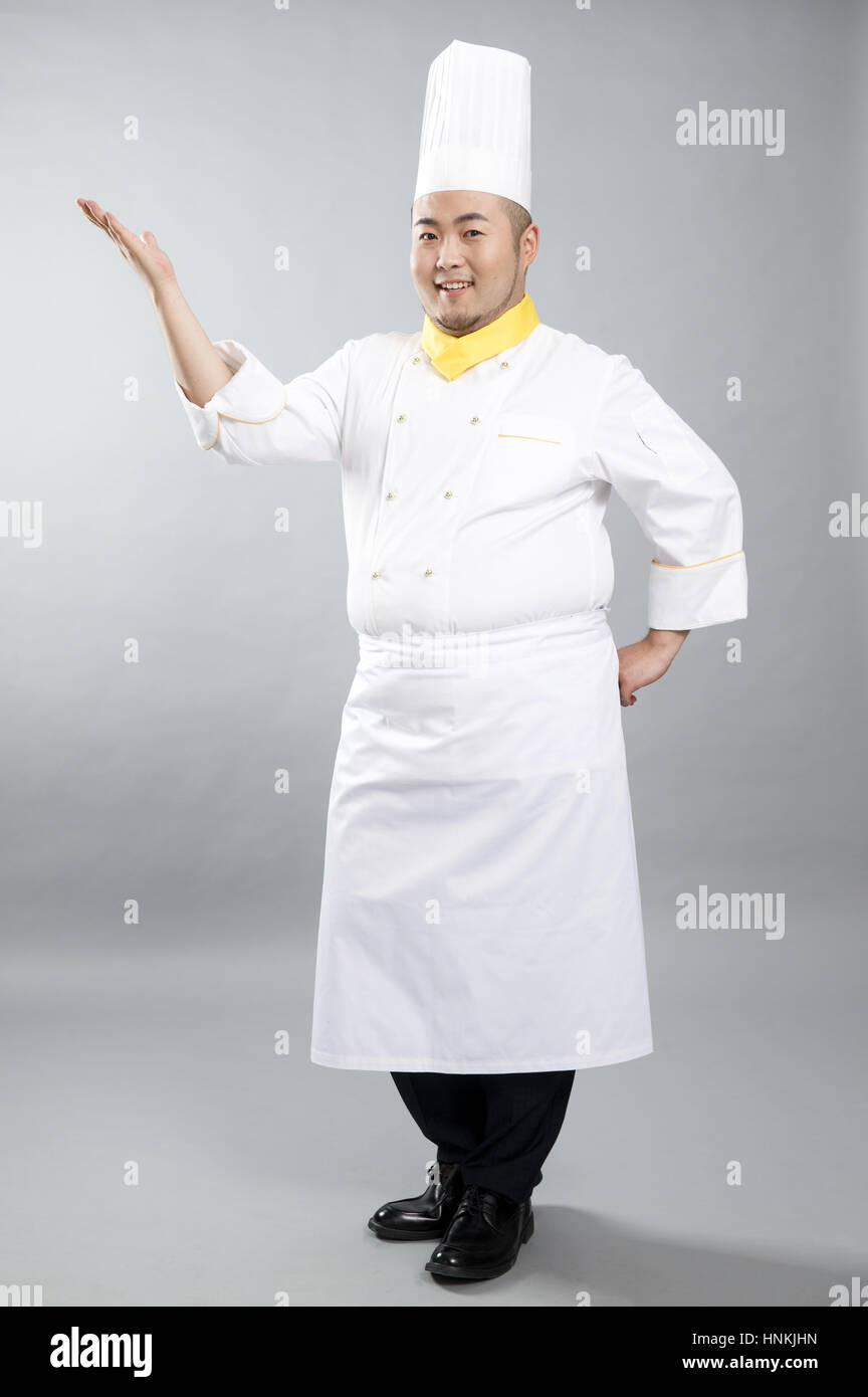 Confident young fat cook Stock Photo - Alamy