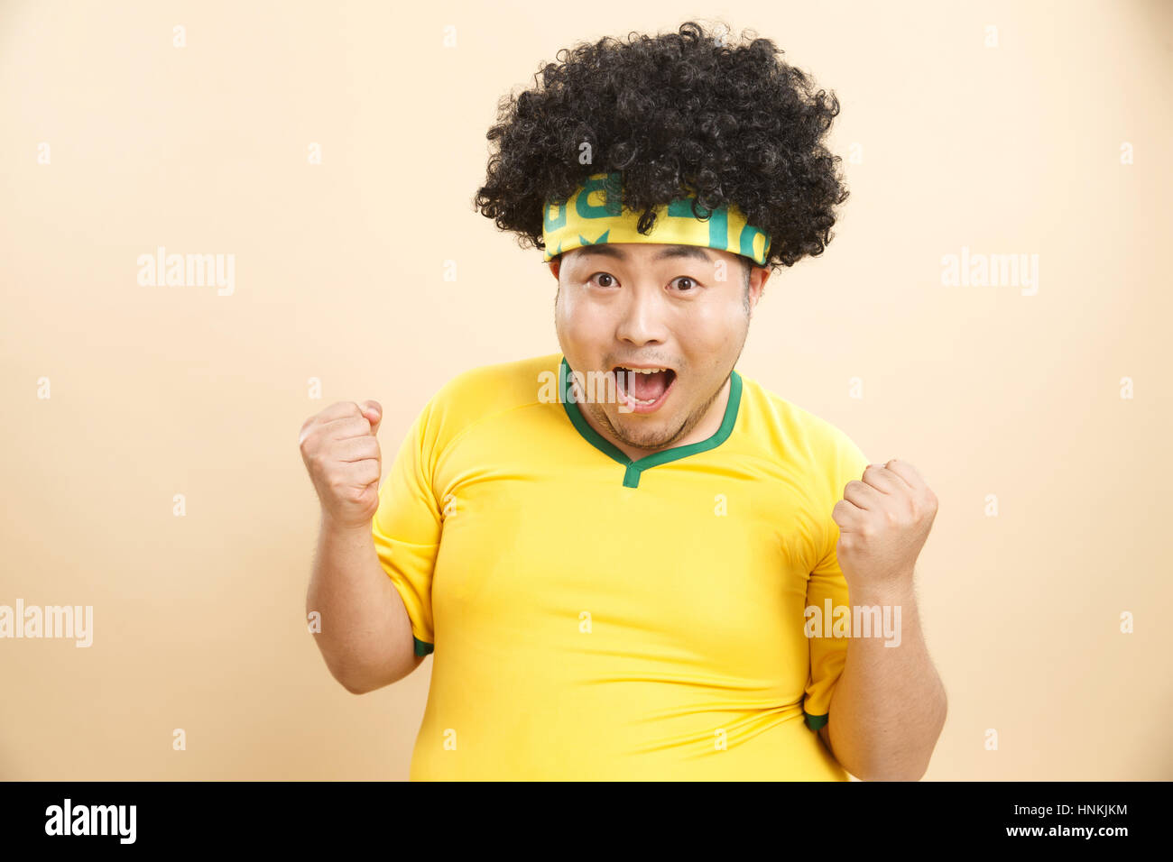 Excited young male fans Stock Photo - Alamy