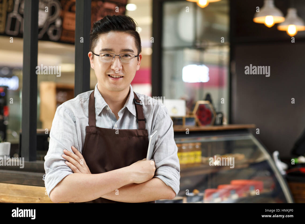 Coffee shop attendant Stock Photo - Alamy