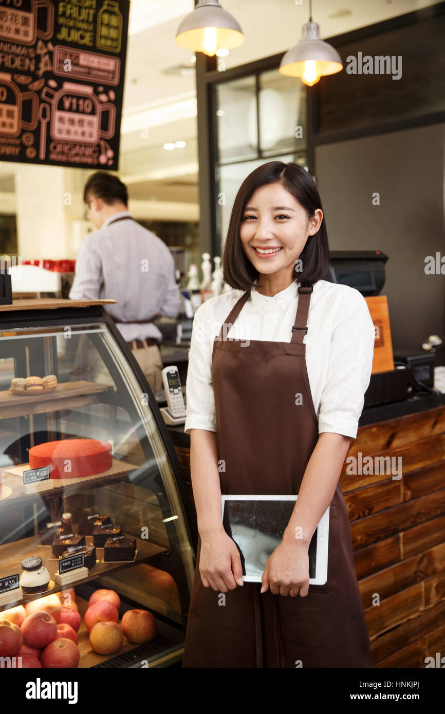 Coffee shop attendant Stock Photo - Alamy