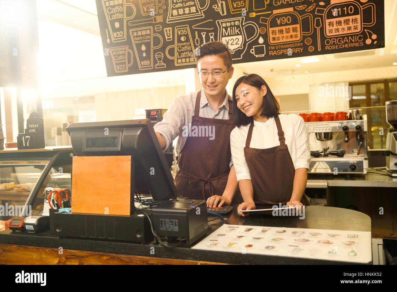 Indian cafe shopkeeper hi-res stock photography and images - Alamy