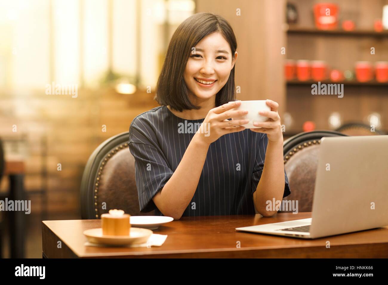 Young women in the coffee shop Stock Photo - Alamy