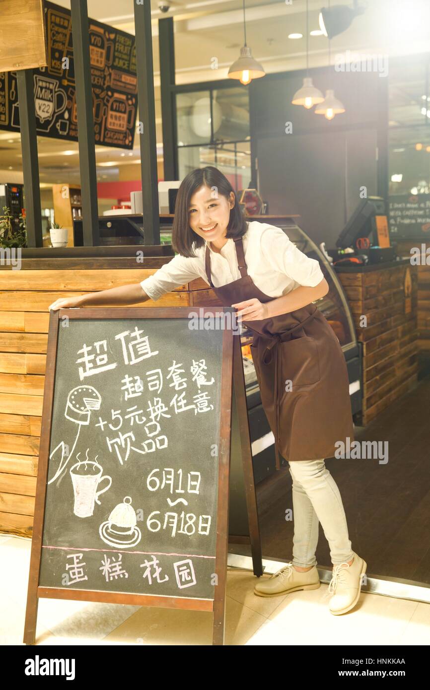 Coffee shop attendant Stock Photo - Alamy