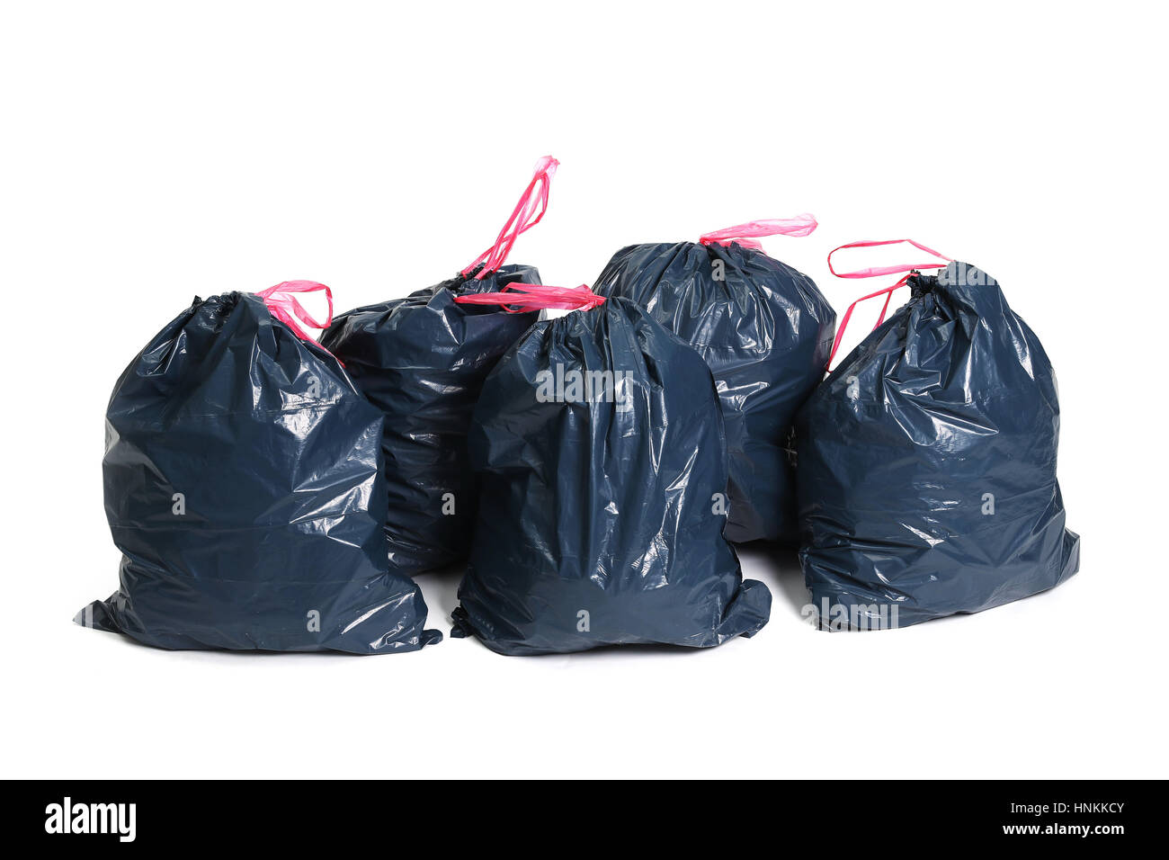 Pollution. Trash bags on a white background Stock Photo - Alamy