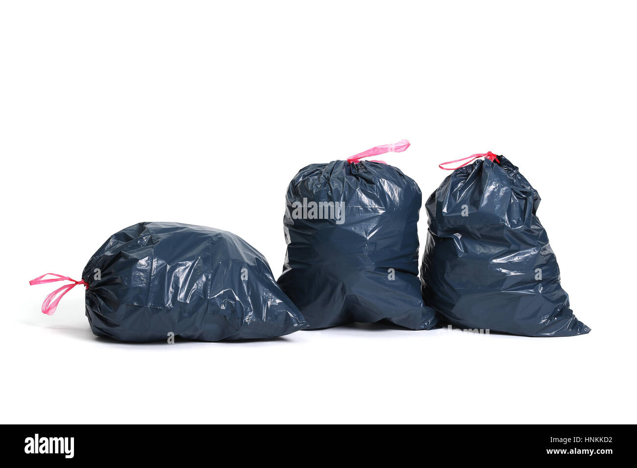 Pollution. Trash bags on a white background Stock Photo - Alamy