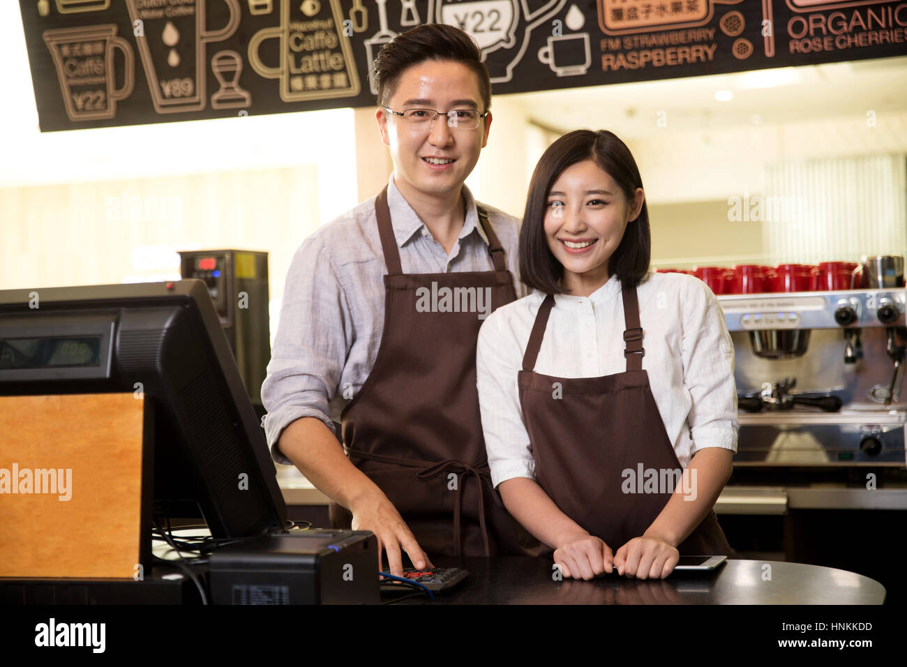 Couple indian restaurant waiter hi-res stock photography and images - Alamy