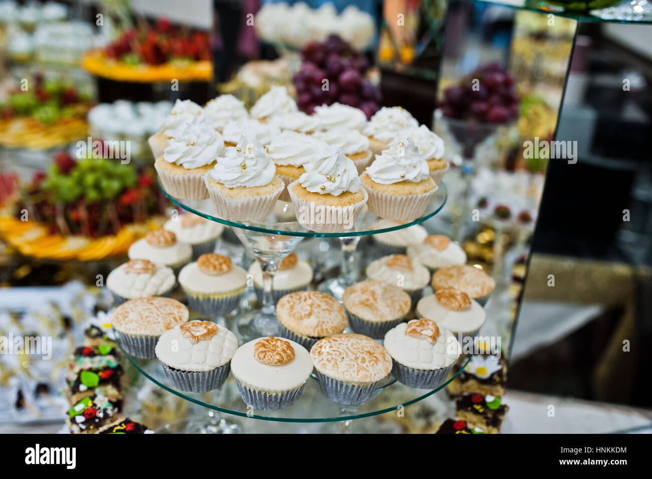 Different swets and cakes at wedding reception Stock Photo - Alamy