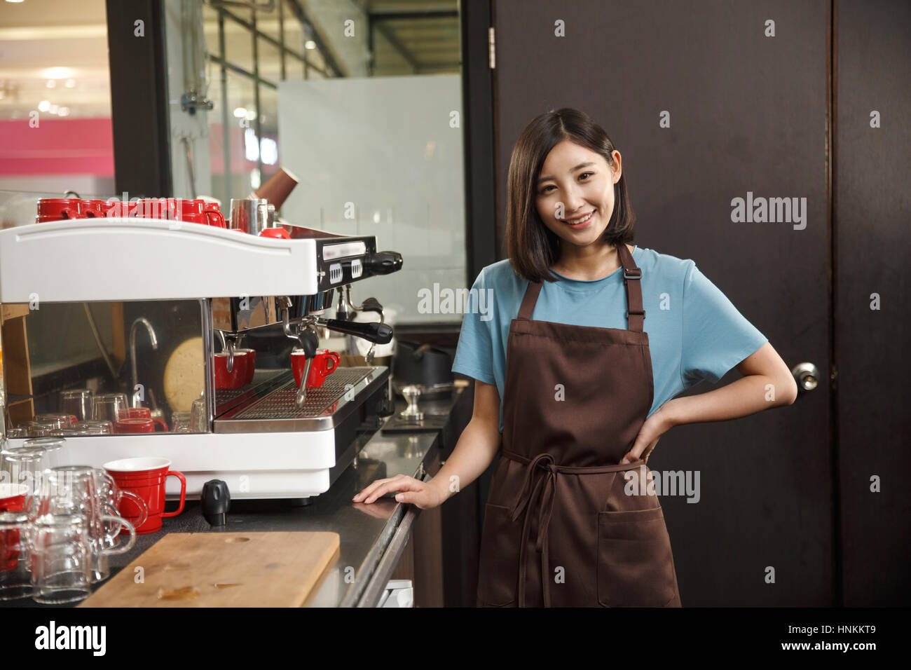 Coffee shop attendant Stock Photo - Alamy