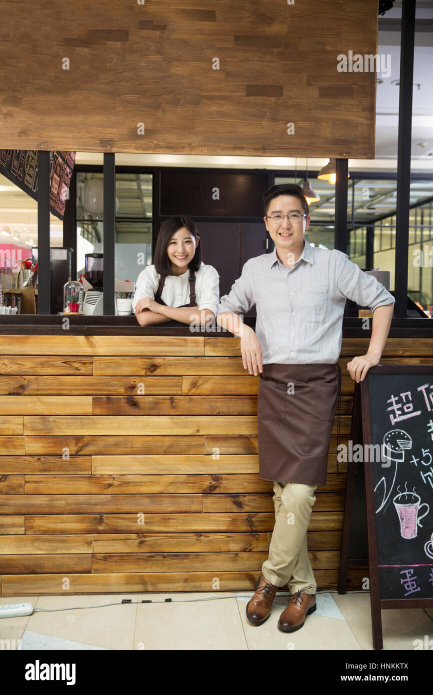 Coffee shop attendant Stock Photo - Alamy