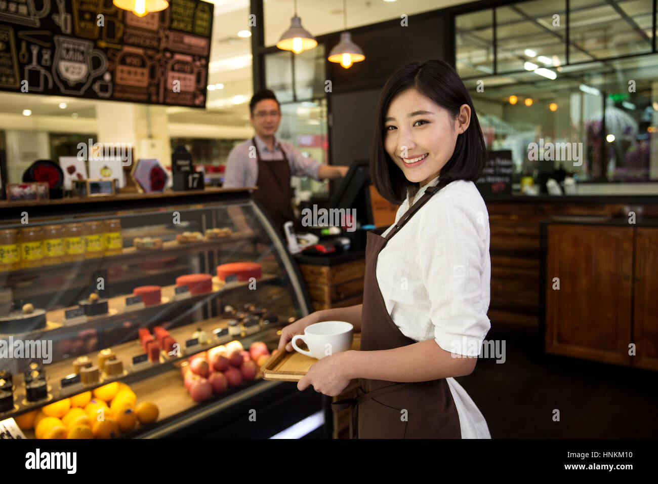 Coffee shop attendant Stock Photo - Alamy