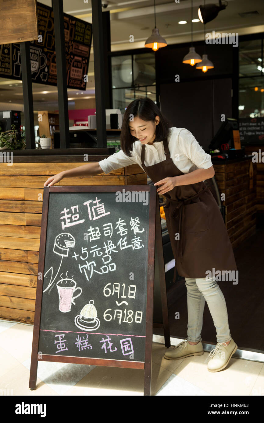 Coffee shop attendant Stock Photo - Alamy