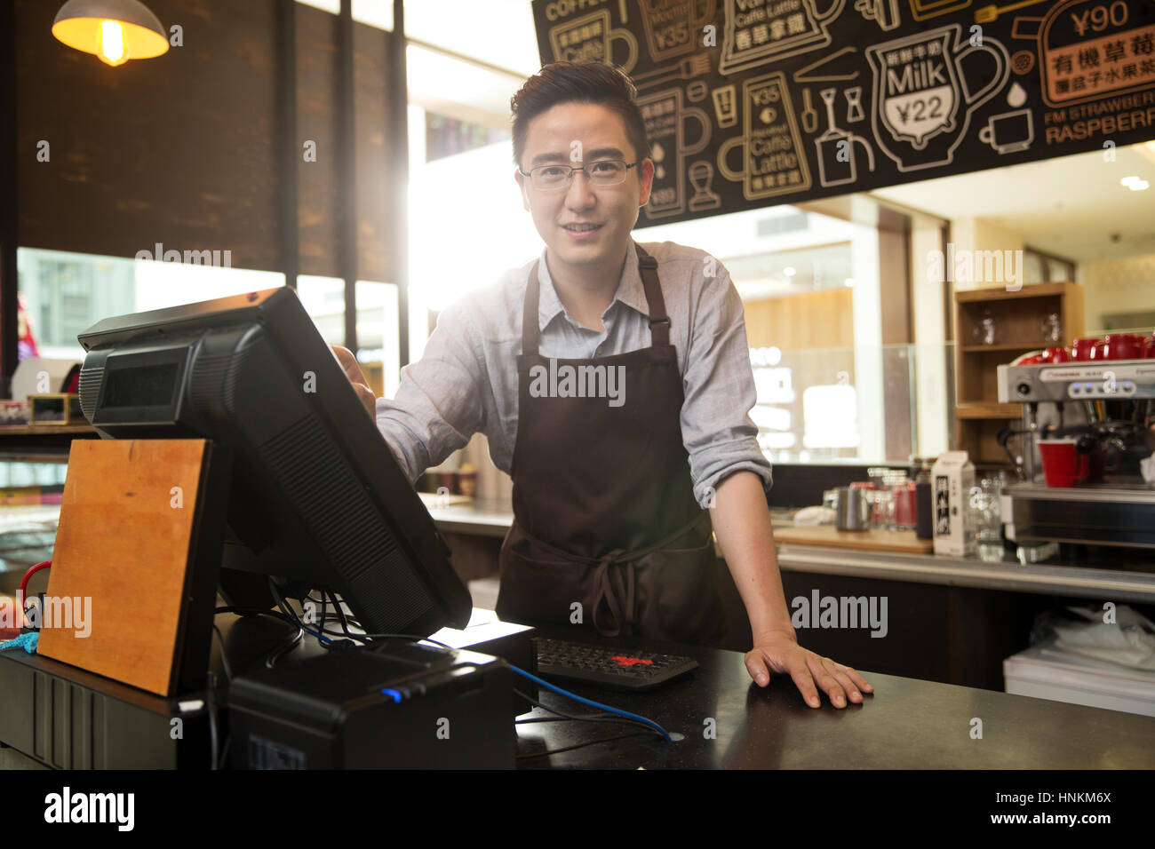 Waiter cashier hi-res stock photography and images - Alamy