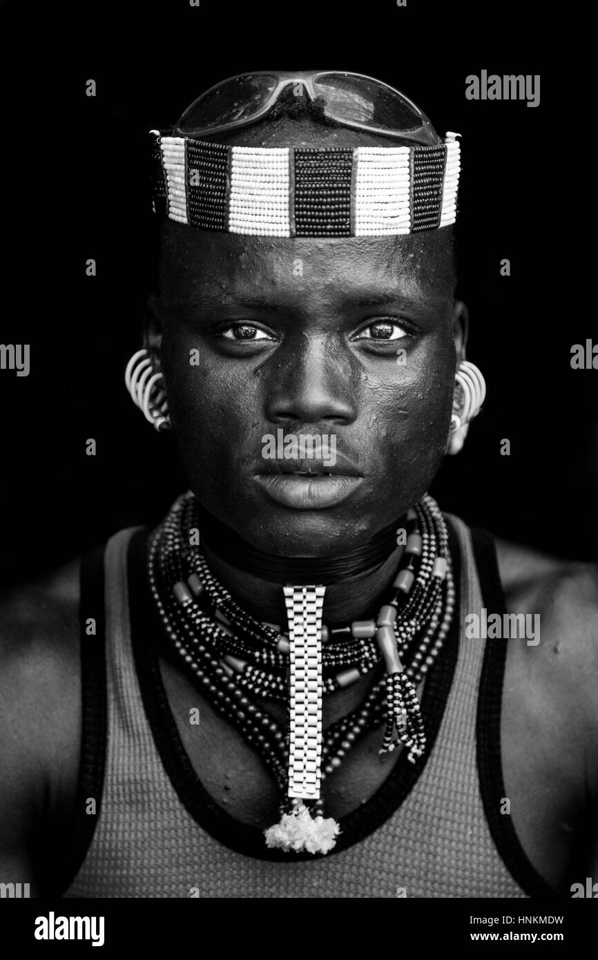 African tribesman young Black and White Stock Photos & Images - Alamy