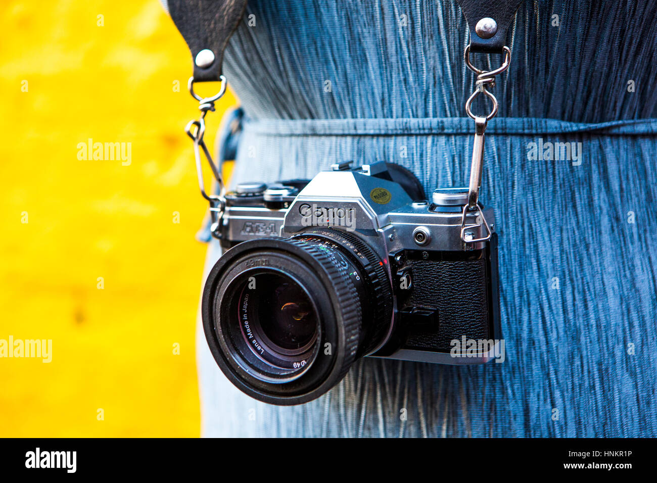 Canon camera around neck hi-res stock photography and images - Alamy