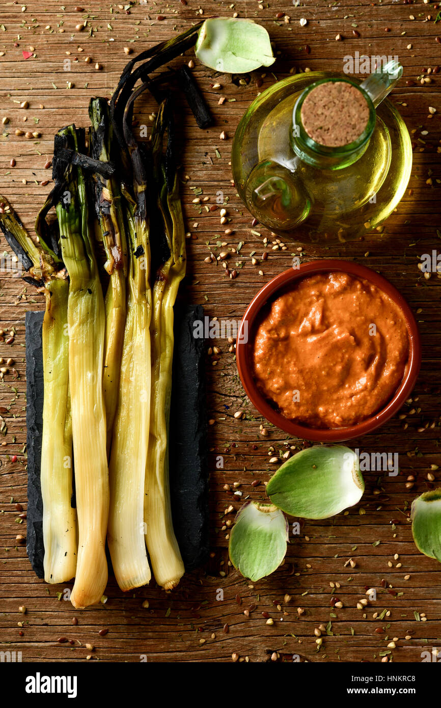high-angle shot of some roasted calcots, sweet onions typical of ...