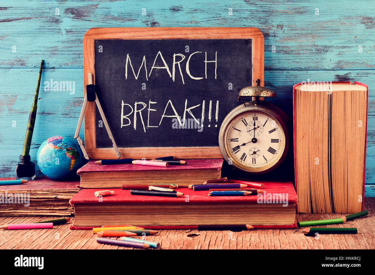 wooden-framed chalkboard with the text march break written in it on a ...