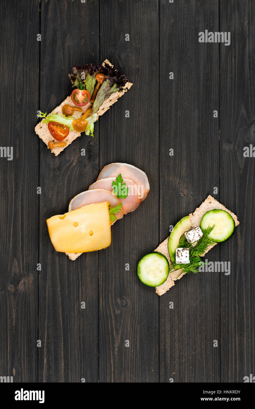 Three sandwiches lying parallel to each other Stock Photo - Alamy