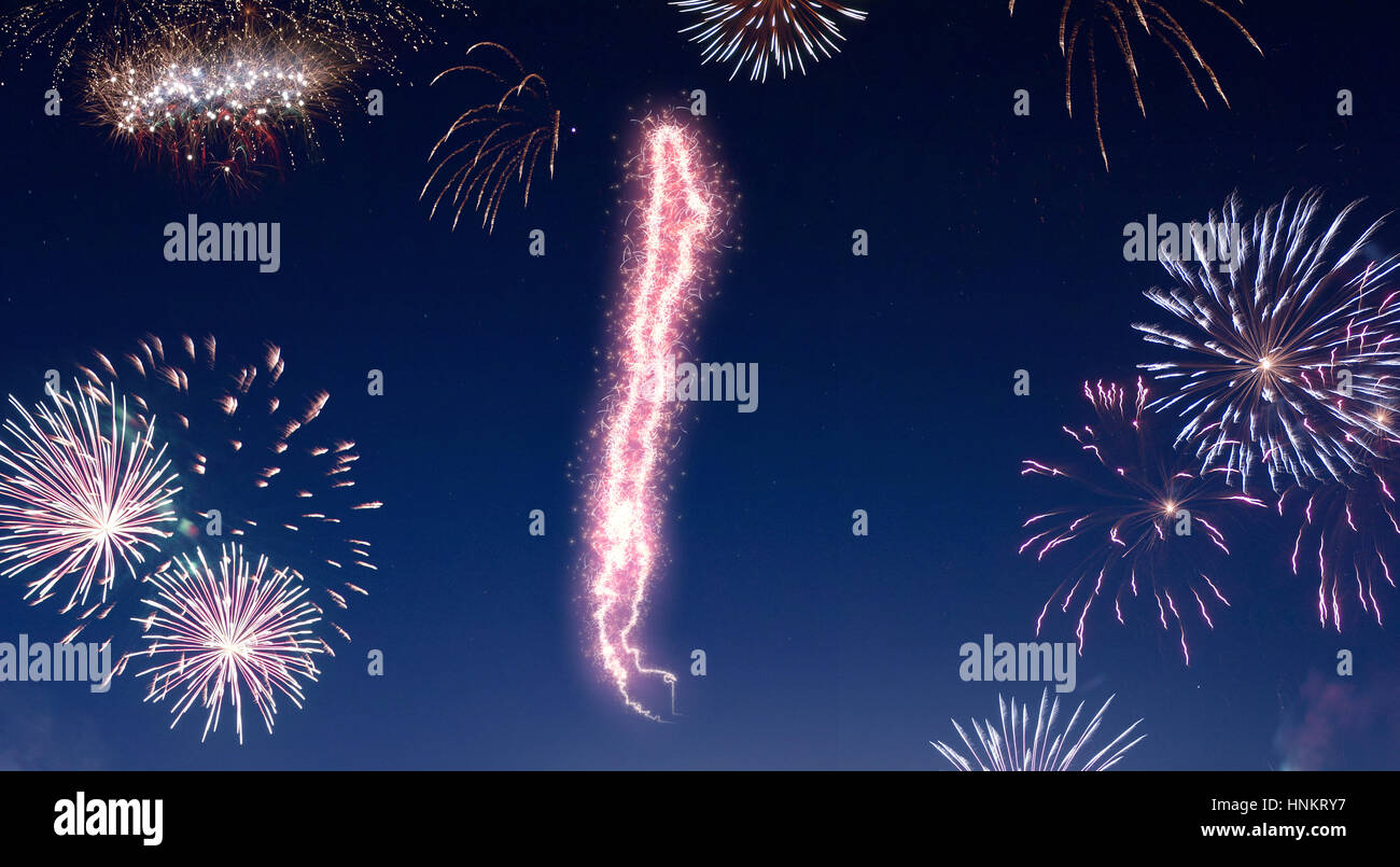 A dark night sky with a sparkling red firecracker in the shape of Chile ...
