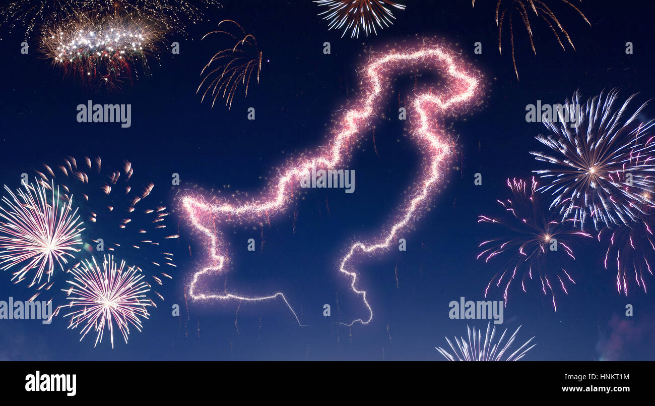 A dark night sky with a sparkling red firecracker in the shape of ...