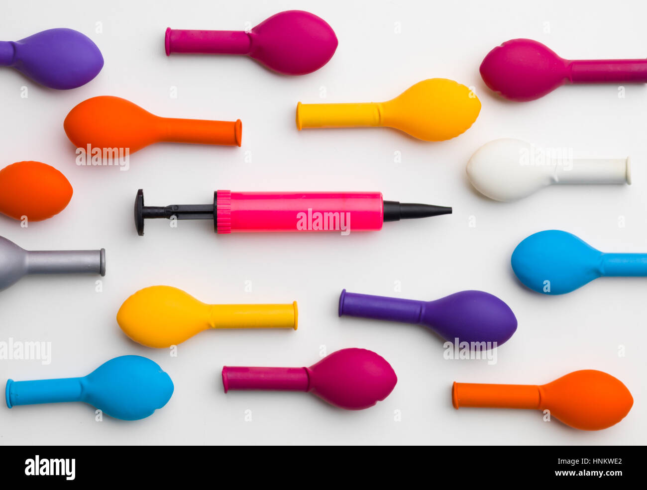 Pink balloon pump between colorful hi-res stock photography and images ...