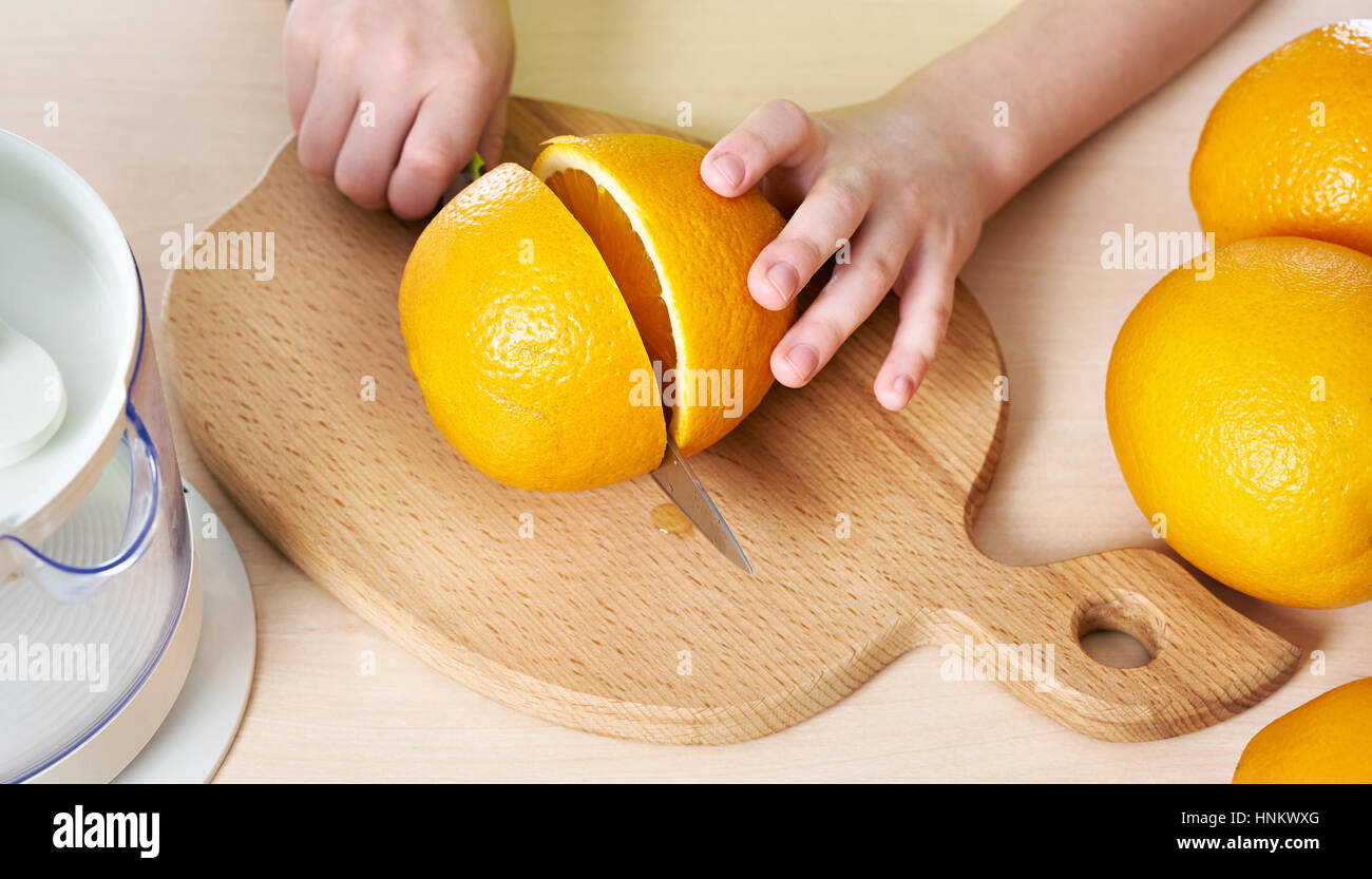 Child cutting food with knife hi-res stock photography and images - Alamy