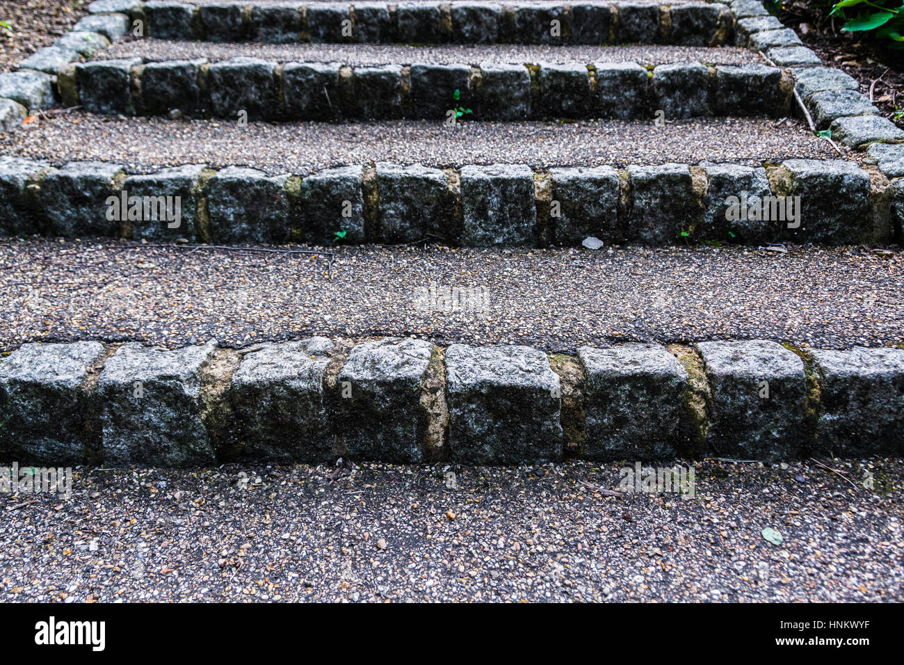 Stone steps with gravel texture - upwards Stock Photo - Alamy