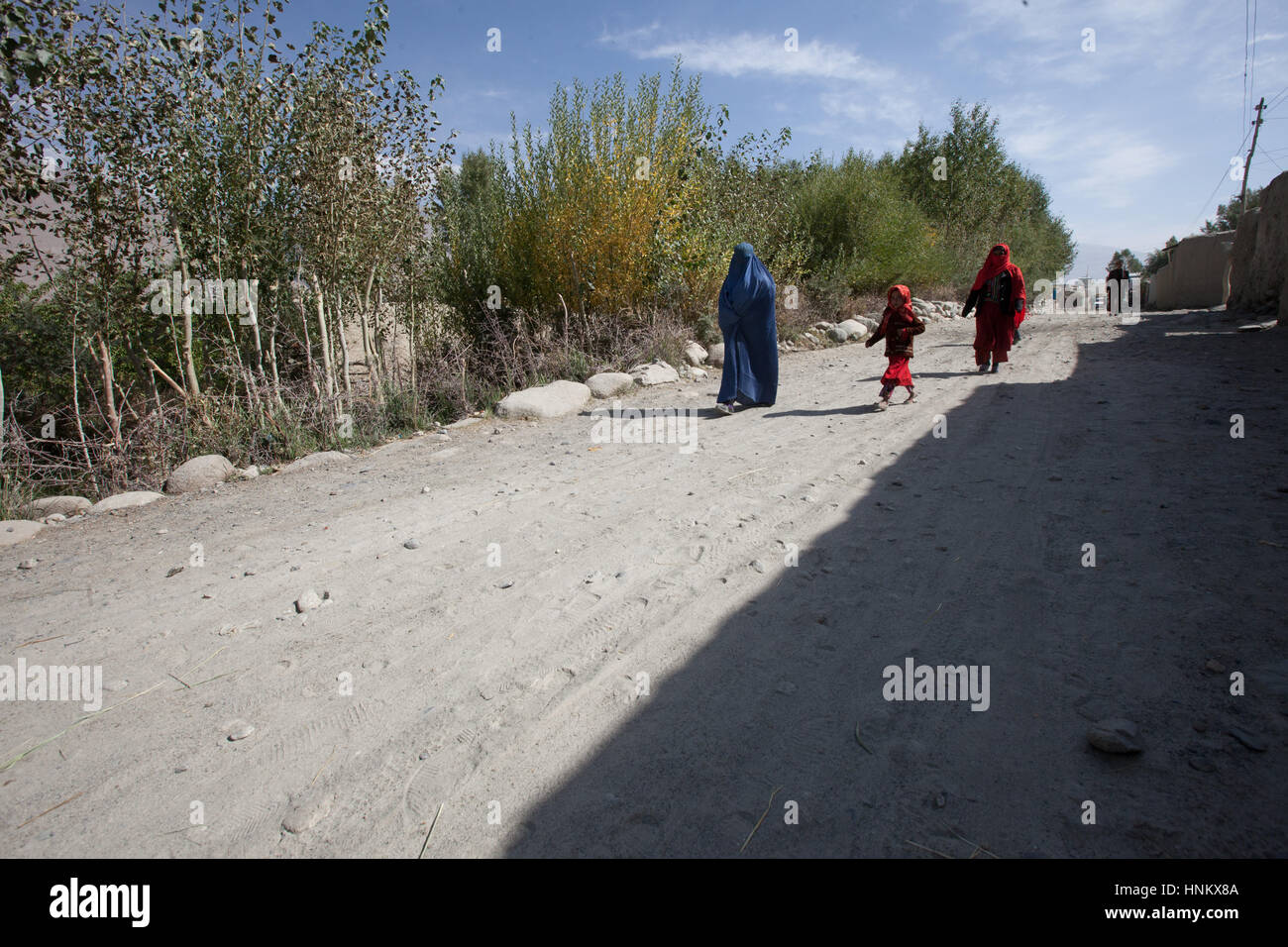 Afghanistan, Wakhan corridor, two women with veil are walking with a ...