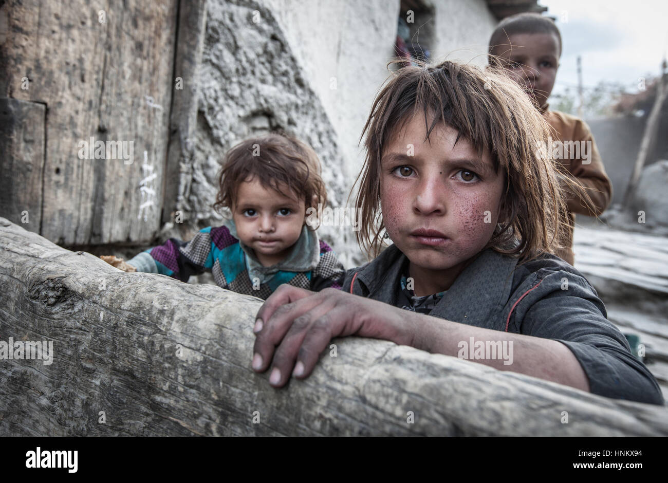 Afghanistan, Wakhan corridor a portrait of two poor and dirty kids with ...
