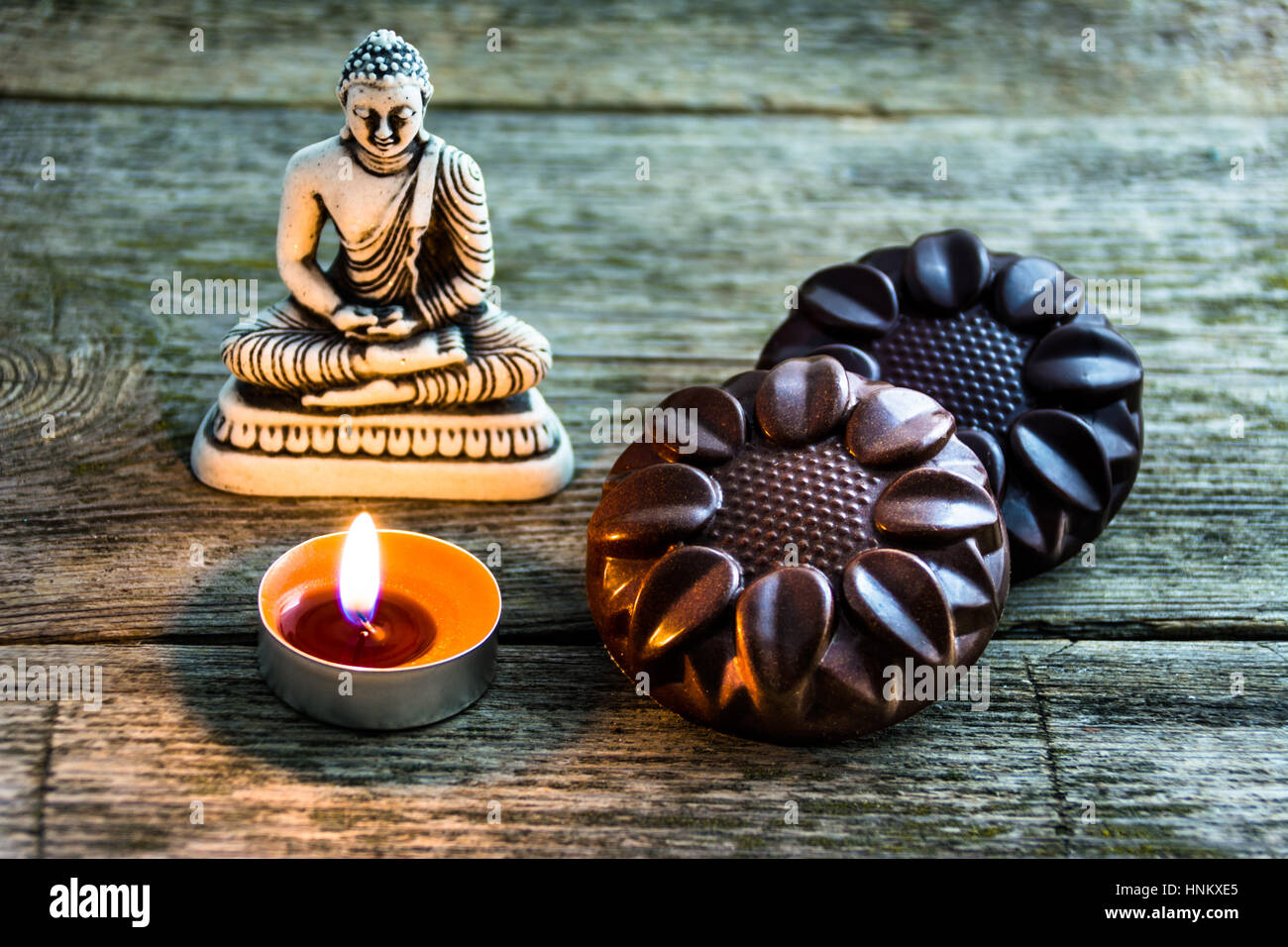 natural chocolate and Buddha Stock Photo - Alamy
