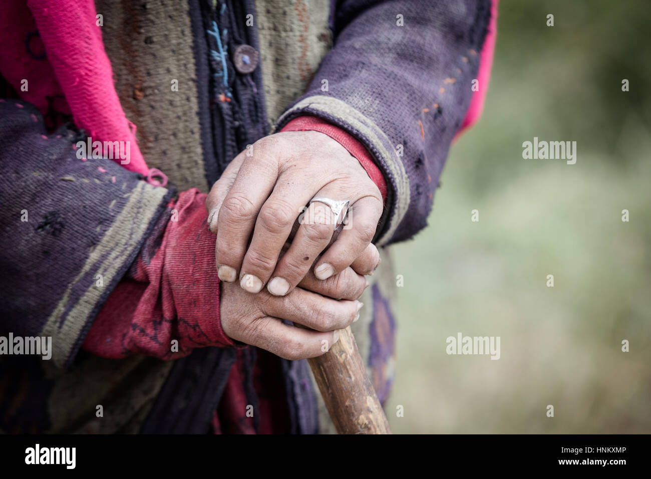 Afghanistan, Wakhan corridor, a close up of woman's hands with a ring ...