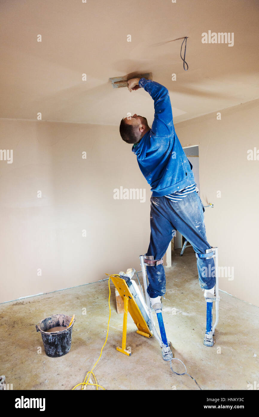 Wearing full length overalls hi-res stock photography and images - Alamy