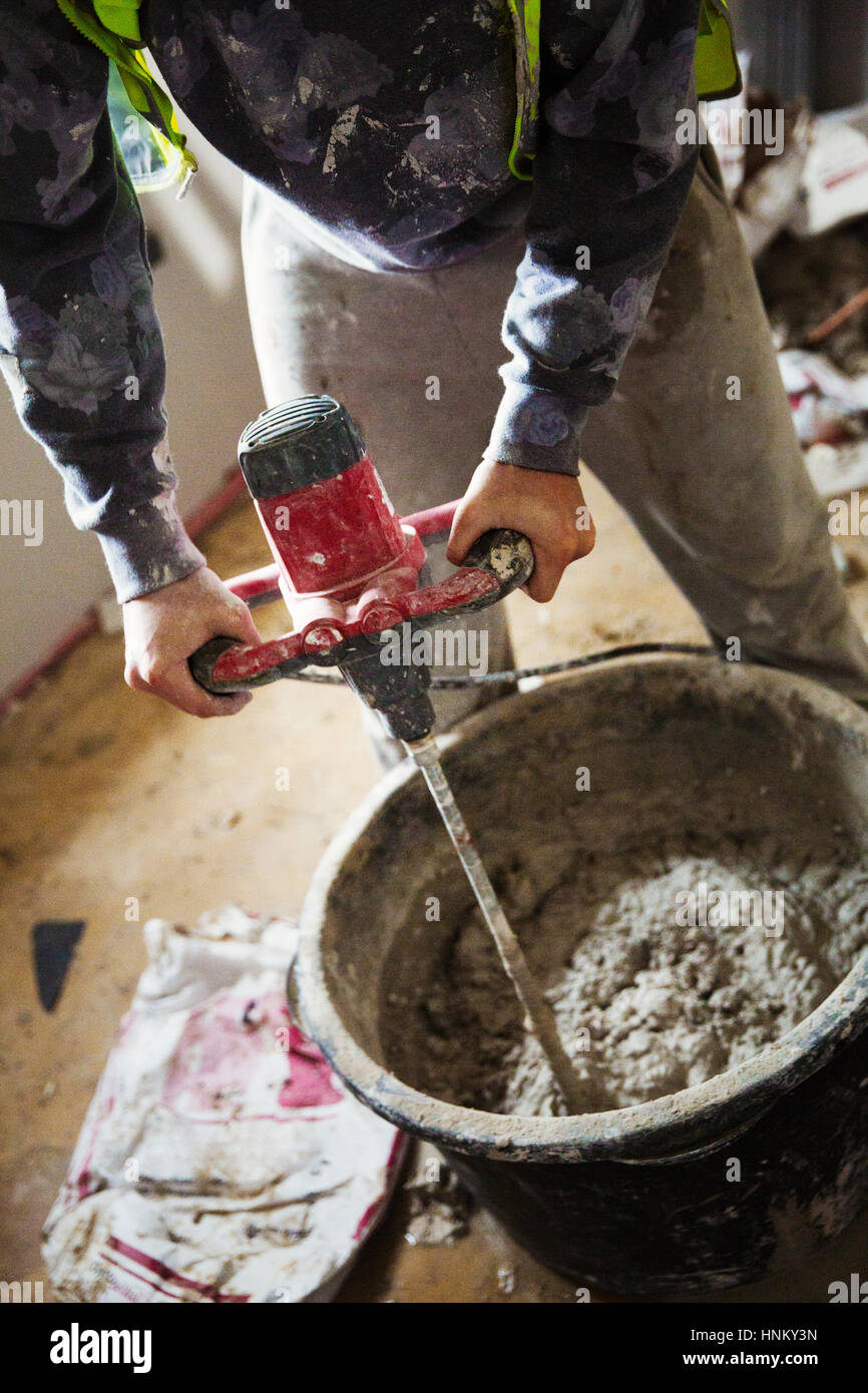 Builder mixing hi-res stock photography and images - Alamy