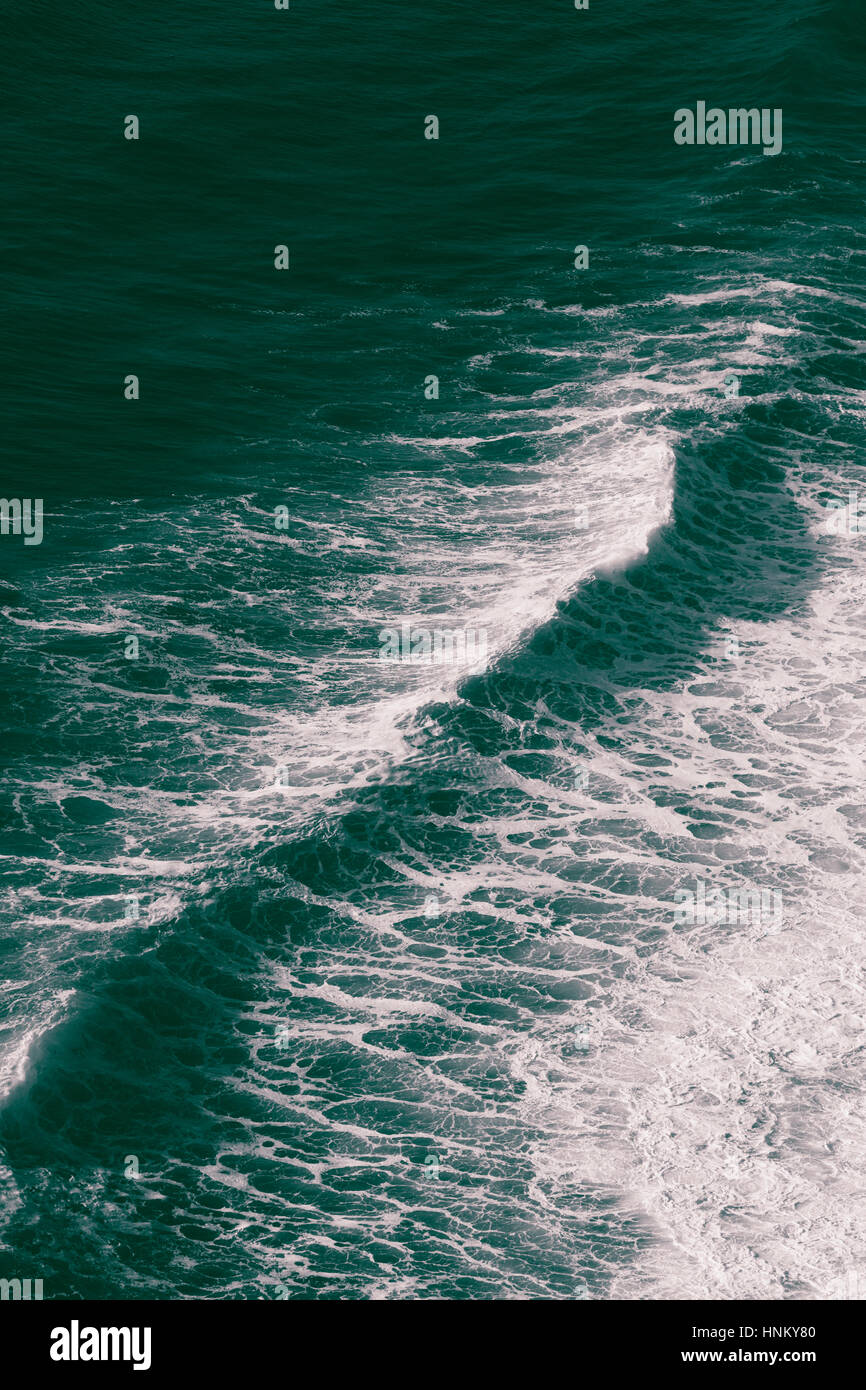 Overhead view of crashing wave and surf on the coast of Oregon Stock ...