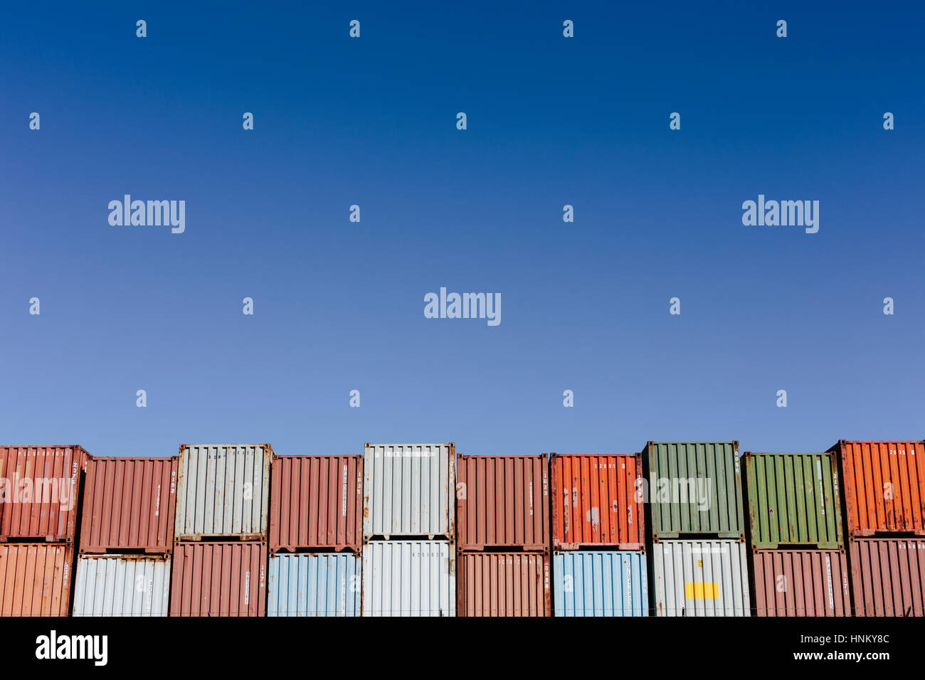 Stacks of multi coloured shipping containers Stock Photo - Alamy