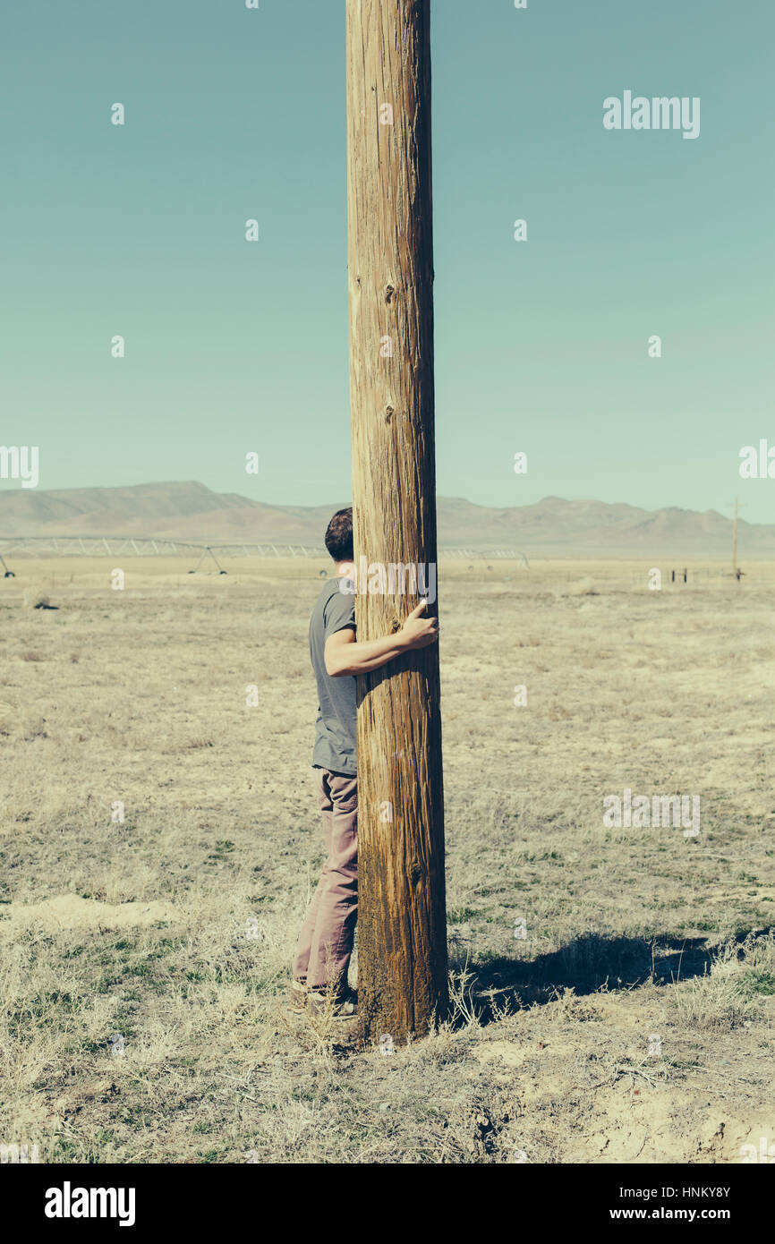 Clinging to a pole hi-res stock photography and images - Alamy