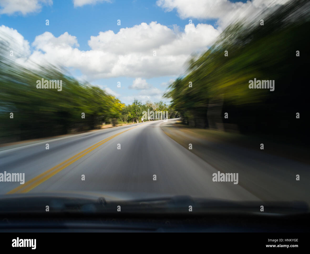 Driver's Point of View Motion Blurred on Country Road Stock Photo - Alamy