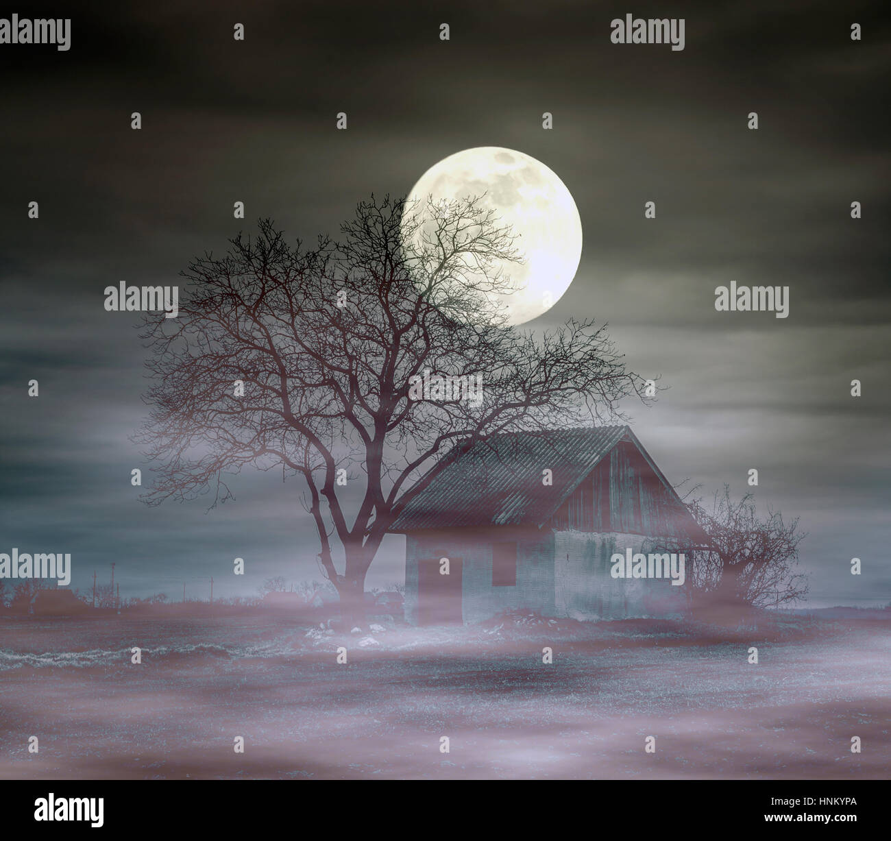 Spooky ghost house at night Stock Photo - Alamy