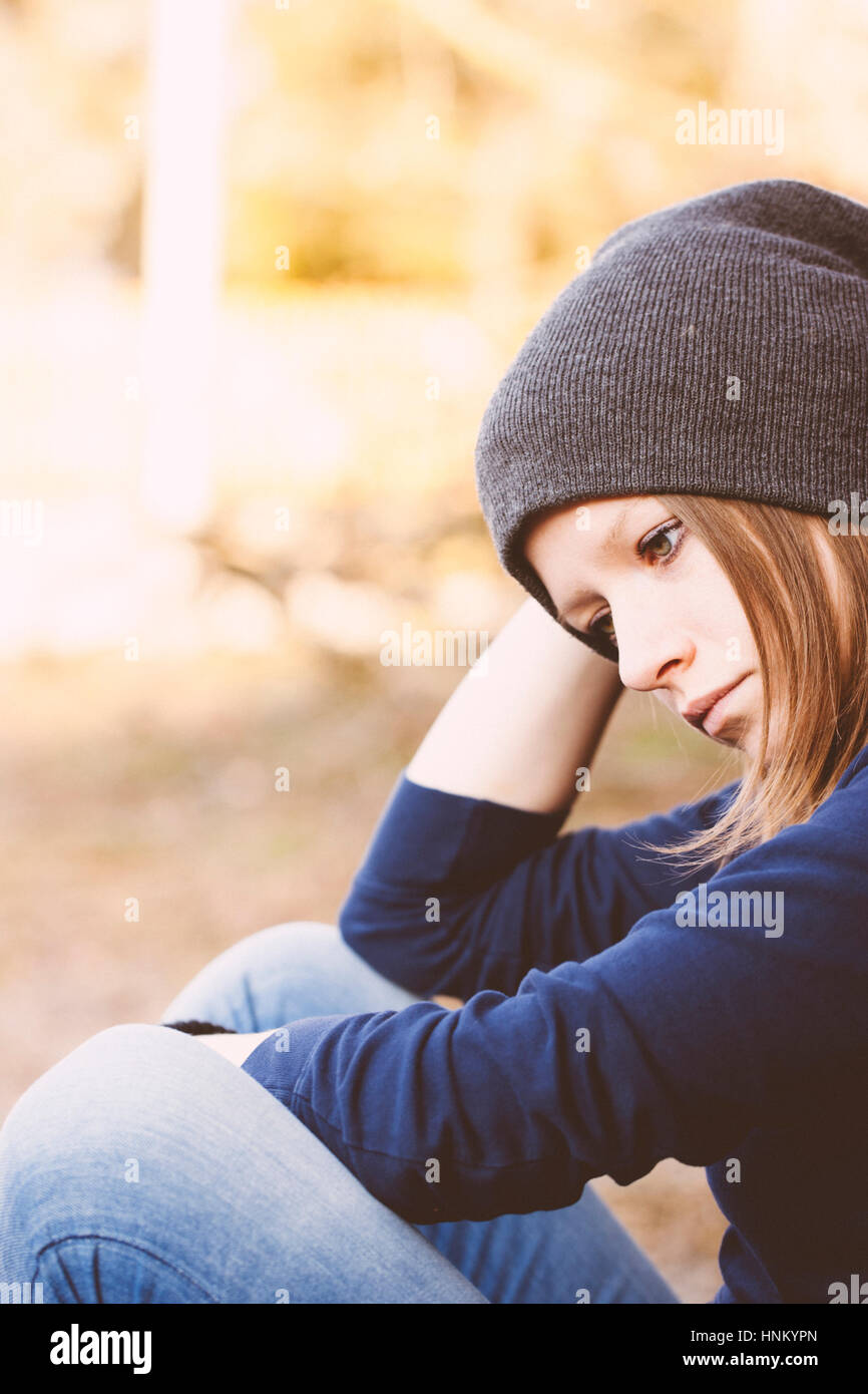 Sad depressed teenager girl Stock Photo - Alamy
