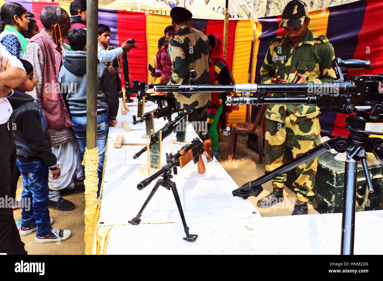 Border security force (BSF) personnel displaying their weapons in ...